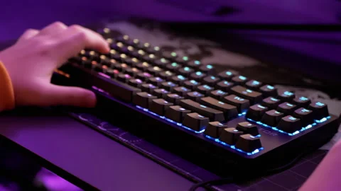 Hands Gamer Playing an RGB Keyboard in a... | Stock Video | Pond5