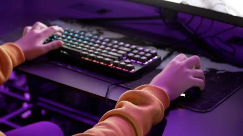 Hands Gamer Playing an RGB Keyboard in a... | Stock Video | Pond5