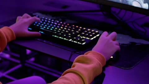 Hands Gamer Playing an RGB Keyboard in a... | Stock Video | Pond5