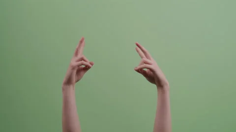 Hands Gesture Air Quotes in Front of Gre... | Stock Video | Pond5