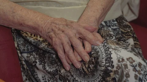 Hands of girl child are caressing grandm... | Stock Video | Pond5