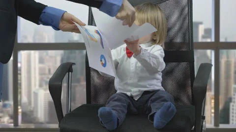 Hands give to little child paperwork, ch... | Stock Video | Pond5