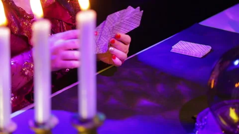 Hands gypsy folding cards on the table. ... | Stock Video | Pond5