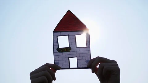 Hands Holding a Little House Design, Sky... | Stock Video | Pond5