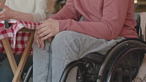 Hands of Man with Disability at Cafe Tab... | Stock Video | Pond5