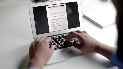 Hands of man filling out job application... | Stock Video | Pond5