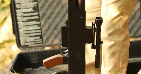 Hands of a Man Loading Bullet Into A Rif... | Stock Video | Pond5