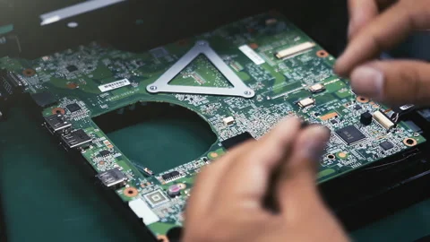 Hands of Man placing Components on PCB B... | Stock Video | Pond5