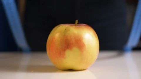 Hands measuring apple circumference, fru... | Stock Video | Pond5