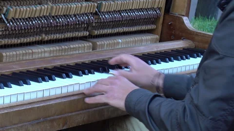 Hands of a muzakant play the keys of an ... | Stock Video | Pond5