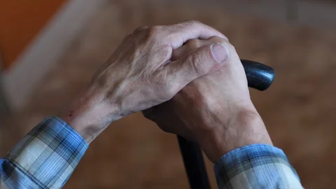 the hands of an old man sitting and lean... | Stock Video | Pond5