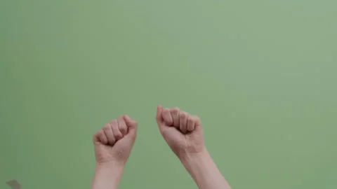 Hands Pumping with Fists with Confetti F... | Stock Video | Pond5