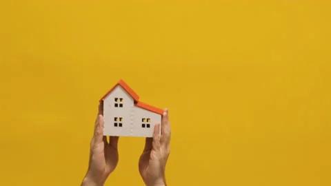 Hands raise and lower the model of the h... | Stock Video | Pond5