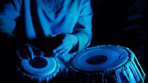Hands of tabla player drumming intensely... | Stock Video | Pond5