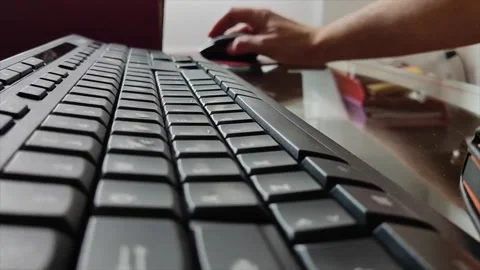 hands tap on black keyboard and moves mo... | Stock Video | Pond5