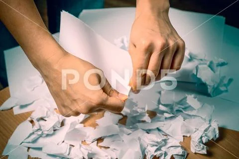 Hands tear paper. overstrain, nerves, psychosis Stock Photo #103654010