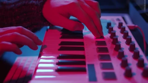 Hands using midi keyboard in home studio... | Stock Video | Pond5