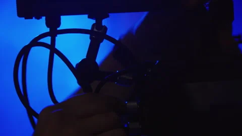 Hands of Videographer Plugging in Cables... | Stock Video | Pond5