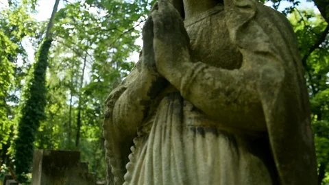 hands of the virgin mary in prayer at th... | Stock Video | Pond5