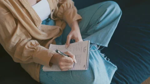 Hands, writing in notepad and person in ... | Stock Video | Pond5