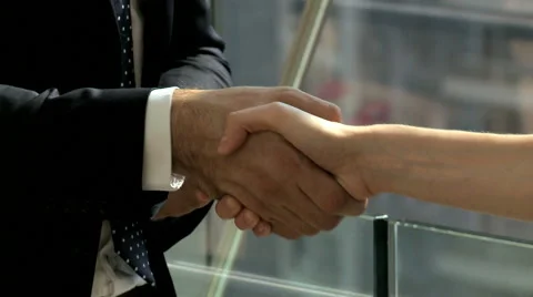 handshake male Western Caucasian female ... | Stock Video | Pond5
