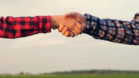 handshake sunset sky, farmer field teamw... | Stock Video | Pond5