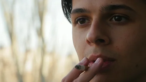 Boy Smoking Cigarette Stock Videos – Royalty-Free HD & 4K Videos