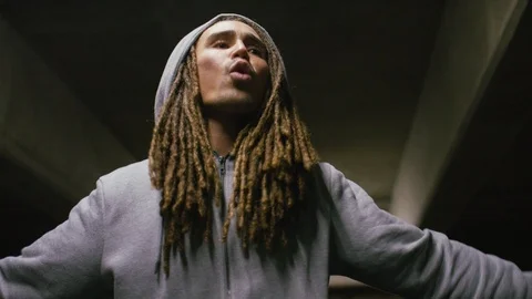 Handsome mixed race man with dreadlocks ... | Stock Video | Pond5