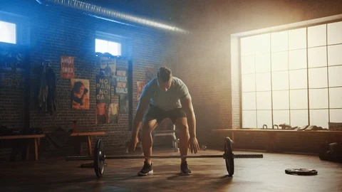 Handsome Muscular Man Does Overhead Dead... | Stock Video | Pond5