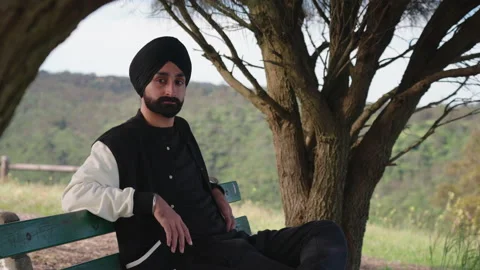Handsome Punjabi Sikh Man Sitting On A B... | Stock Video | Pond5