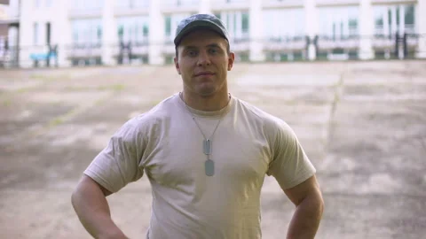 Handsome sergeant looking at camera, arm... | Stock Video | Pond5