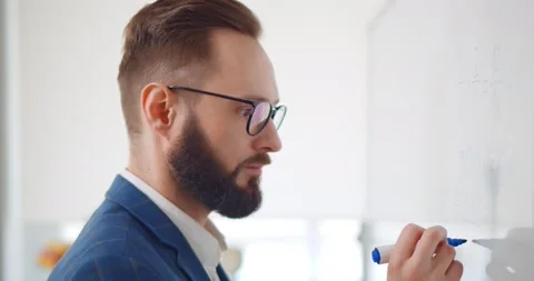Handsome teacher drawing mathematical pr... | Stock Video | Pond5