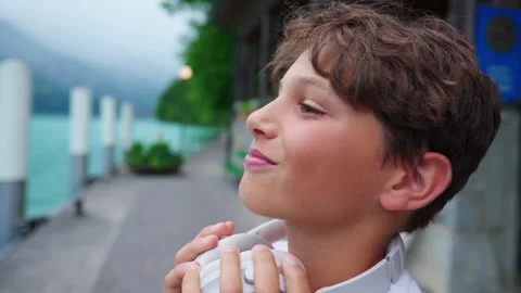 Handsome Teen Boy Pausing Music and cont... | Stock Video | Pond5