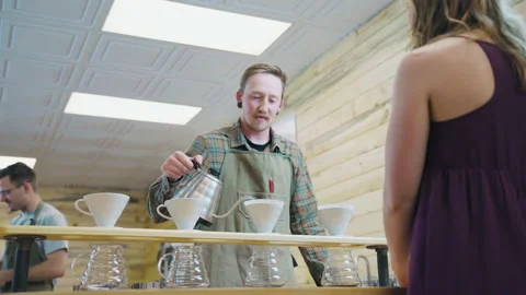 Handsome worker making Drip coffee by po... | Stock Video | Pond5