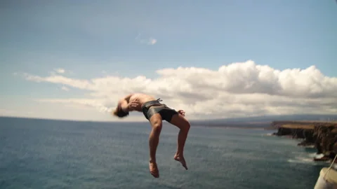 Handsome young man doing a backflip jump... | Stock Video | Pond5