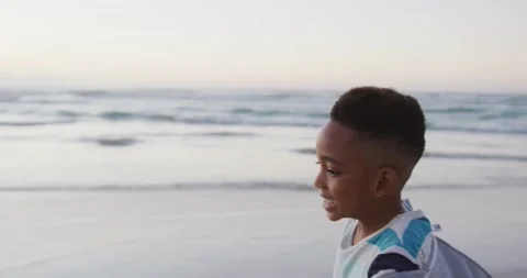 Happy african american boy running alone... | Stock Video | Pond5
