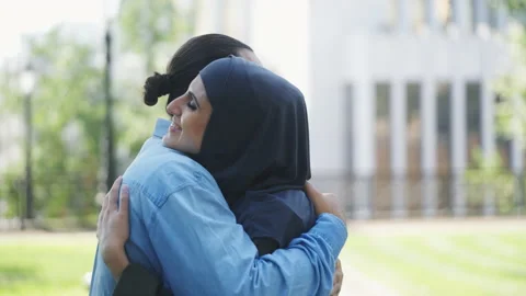 Happy Arab couple hugging in public plac... | Stock Video | Pond5