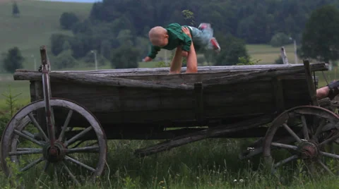 Happy baby boy lift up in traditional wo... | Stock Video | Pond5