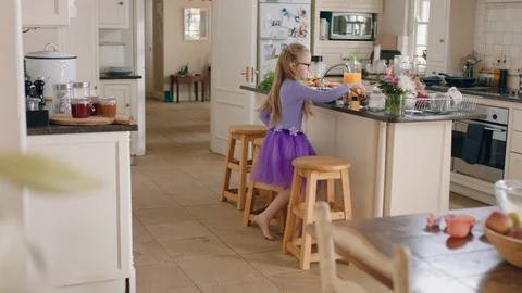 happy ballerina girl dancing in kitchen ... | Stock Video | Pond5