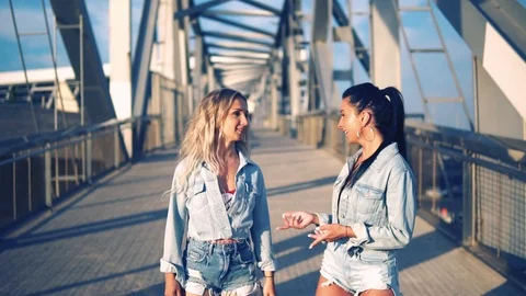 Happy best friends or sisters walking an... | Stock Video | Pond5