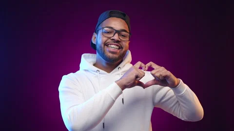 Happy Biracial Man Making Heart Shape wi... | Stock Video | Pond5