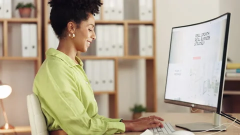 Happy business woman typing on computer ... | Stock Video | Pond5