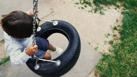 Happy carefree young boy spinning at pla... | Stock Video | Pond5