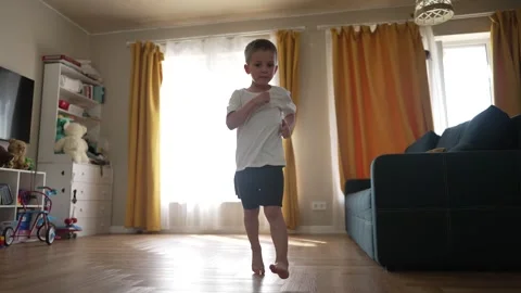 Happy child running at home. boy running... | Stock Video | Pond5