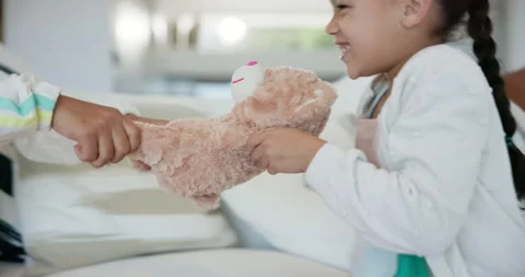 Happy, children and teddy bear fight on ... | Stock Video | Pond5