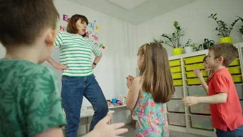 Children Dancing Preschool Classroom Stock Footage ~ Royalty Free Stock ...