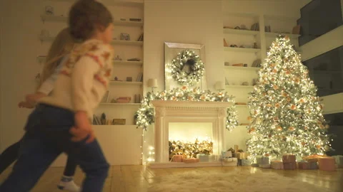 The happy children holding christmas gif... | Stock Video | Pond5