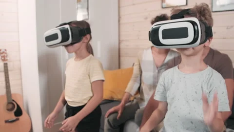 Happy Children Playing Game in VR Headse... | Stock Video | Pond5