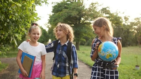 Happy children returning from school. Cl... | Stock Video | Pond5