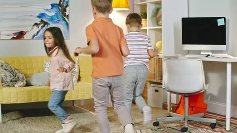 Happy Children Running Around Room | Stock Video | Pond5